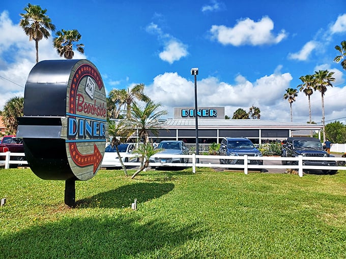 Palm trees and promise: This classic diner beckons like a mirage in the Florida sun, promising comfort food and coastal charm.