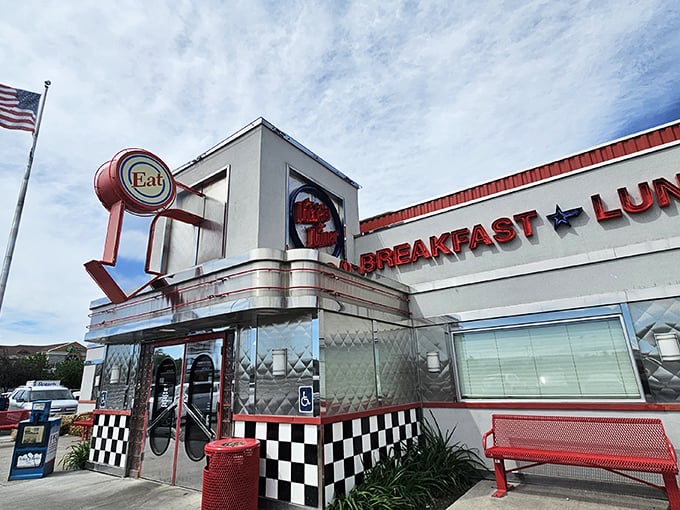 Step into a time machine disguised as a diner! Dixie's chrome exterior and neon sign promise a journey back to the fabulous fifties. 