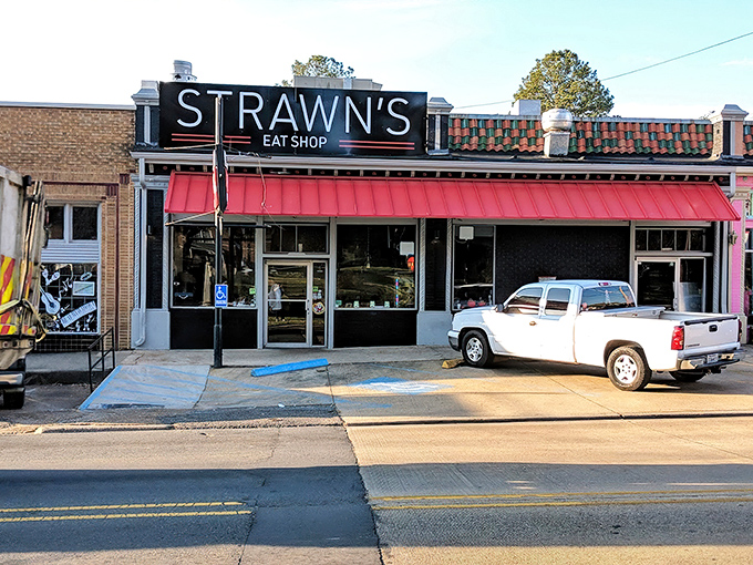 The iconic red awning of Strawn's beckons like a lighthouse for hungry souls. This unassuming brick storefront has been Shreveport's breakfast beacon since 1944.
