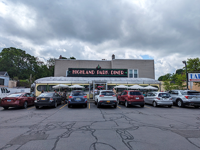 The gleaming stainless steel exterior of Highland Park Diner stands as a time capsule of Americana, beckoning hungry travelers with nostalgic charm.