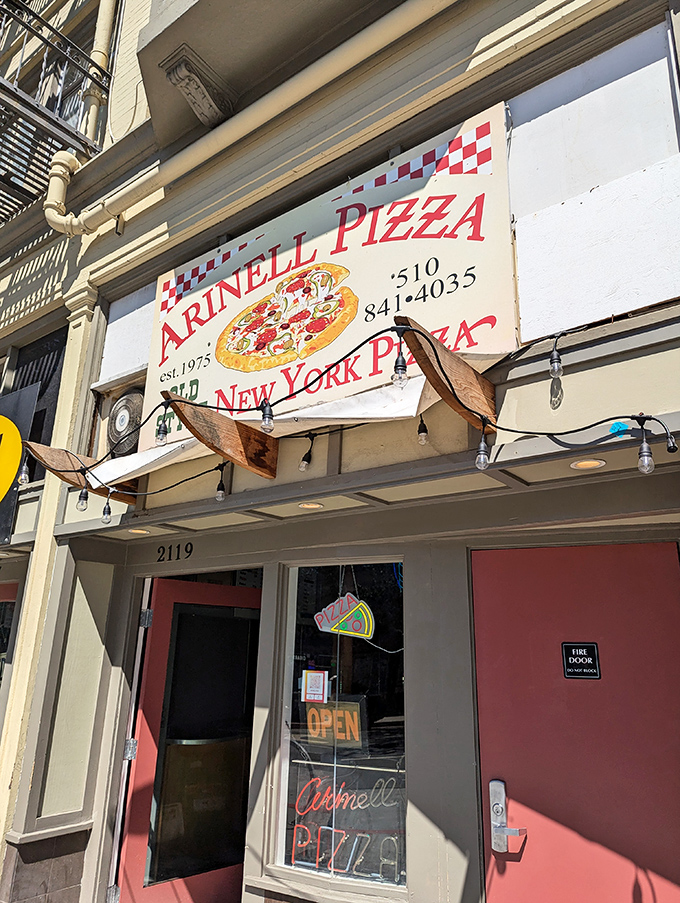 A slice of New York in Berkeley! Arinell Pizza's retro sign promises authentic Big Apple flavor, no subway ride required.