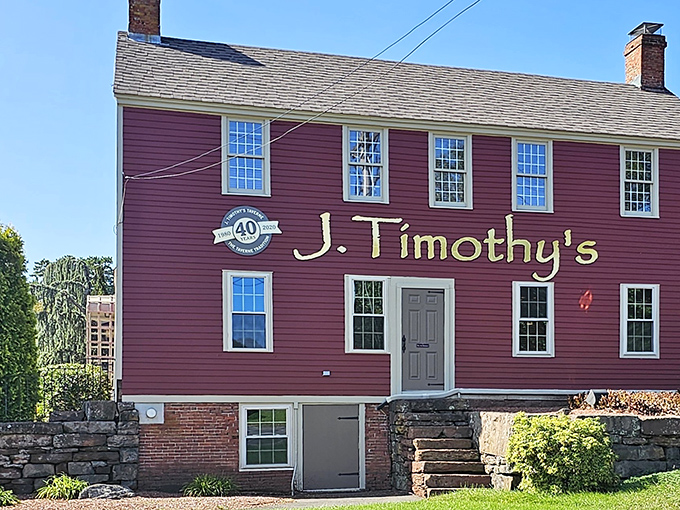 A burgundy beauty with a storied past! J. Timothy's Taverne stands proud, its colonial charm inviting you to step back in time and indulge in modern flavors.
