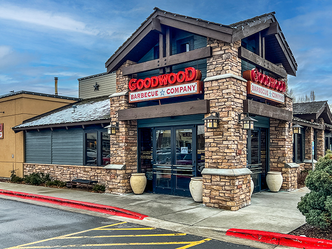 Welcome to Goodwood Barbecue Company, where rustic charm meets mouthwatering aromas. This unassuming exterior hides a world of flavor waiting to be discovered. 