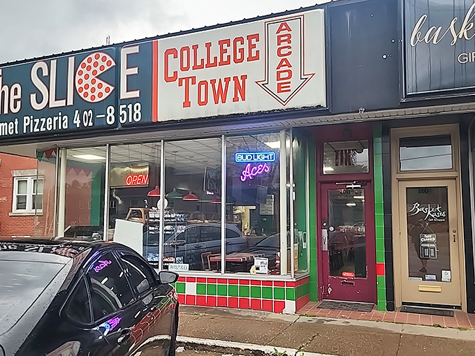 Welcome to pizza paradise! This retro-chic storefront is like a time machine that transports you straight to flavor town.