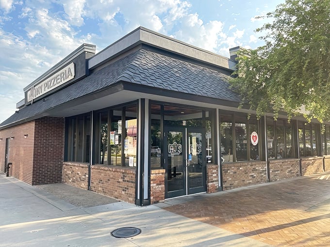 Welcome to AJ's NY Pizzeria, where the Big Apple meets the Little Apple! This unassuming brick facade houses a slice of New York right in the heart of Kansas.
