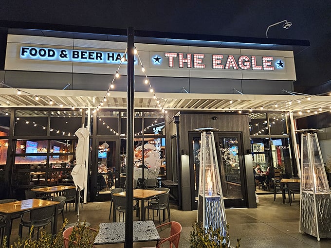 The bold eagle mural watches over this Louisville gem like a patriotic street art guardian announcing "deliciousness lives here."