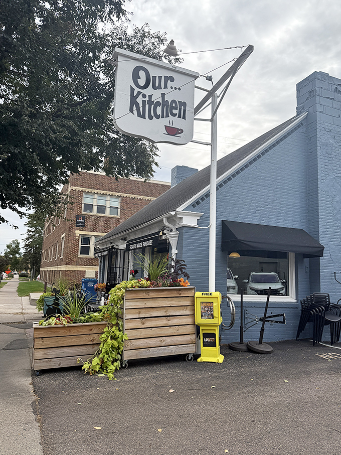 A blue beacon of breakfast bliss! Our Kitchen's charming exterior promises comfort food that'll make your taste buds do the happy dance.