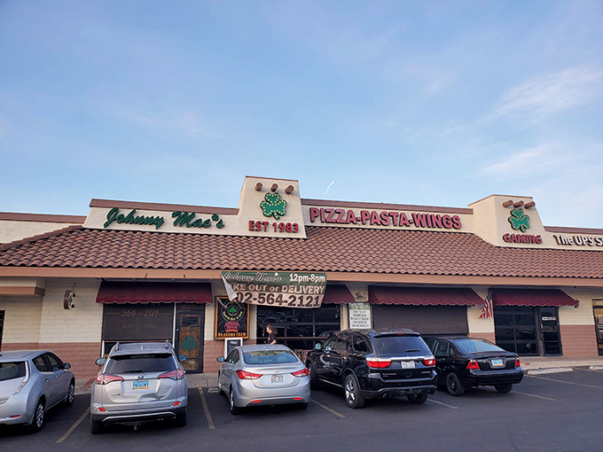 Johnny Mac's: Where sports dreams and buffalo wings collide! This unassuming exterior hides a flavor paradise waiting to be discovered.