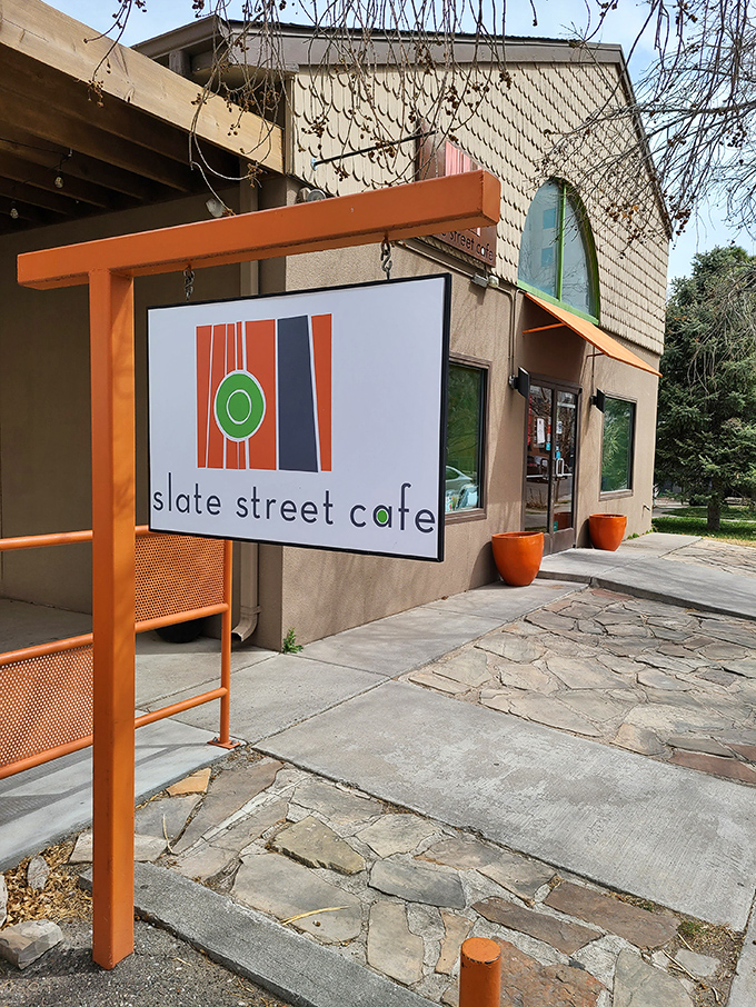 The stucco exterior with distinctive orange planters might not scream "culinary paradise," but locals know better. Sometimes the best treasures hide in plain sight.