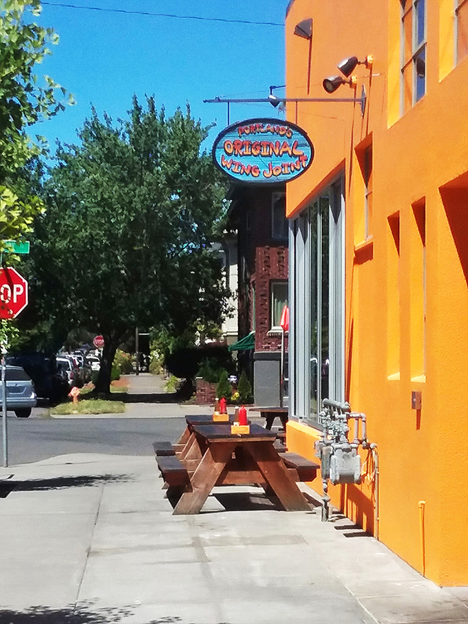 Welcome to wing paradise! Fire on the Mountain's vibrant orange exterior is like a beacon calling all flavor seekers to its doorstep.