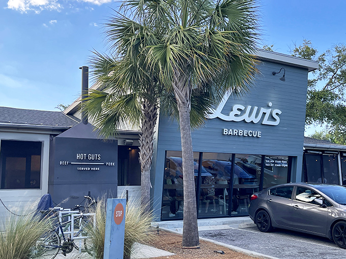 Welcome to Flavor Town: Step into the unassuming charm of this beloved barbecue spot. The smell of smoke whispers secrets of slow-cooked delights.