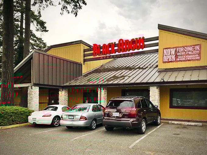 The iconic red sign beckons like a lighthouse for the beef-obsessed, promising respite from trendy small plates and deconstructed disappointments.