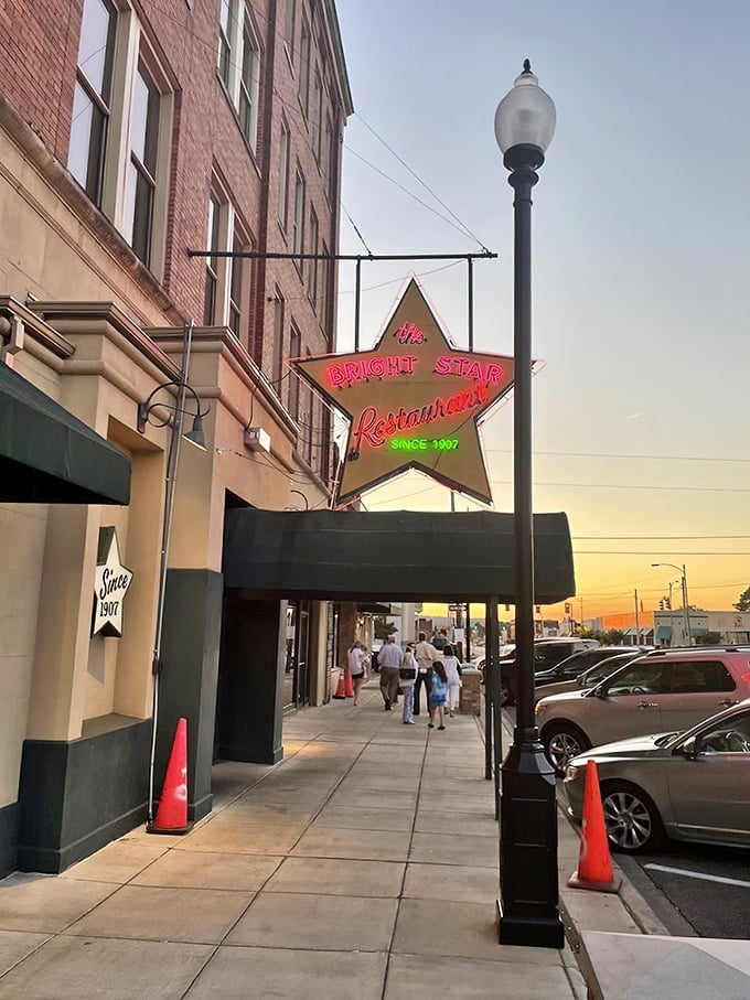 A star is born! The Bright Star's iconic neon sign beckons hungry travelers like a culinary lighthouse, promising delicious adventures within.