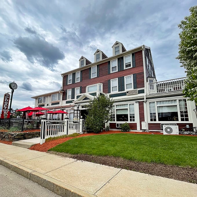 A beacon of culinary delight! The Old Salt's exterior promises a feast for the senses, with its charming New England facade and inviting red accents.