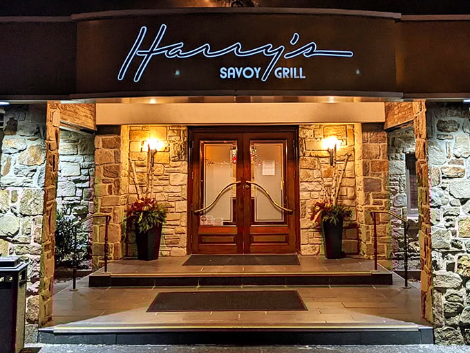 Welcome to Harry's Savoy Grill, where the stone facade whispers "classic" and the neon sign screams "let's eat!" It's like a culinary time machine with modern flair.