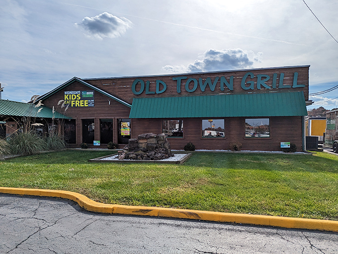 Welcome to flavor town! Old Town Grill's rustic charm and inviting green awning promise a feast for both the eyes and the taste buds.