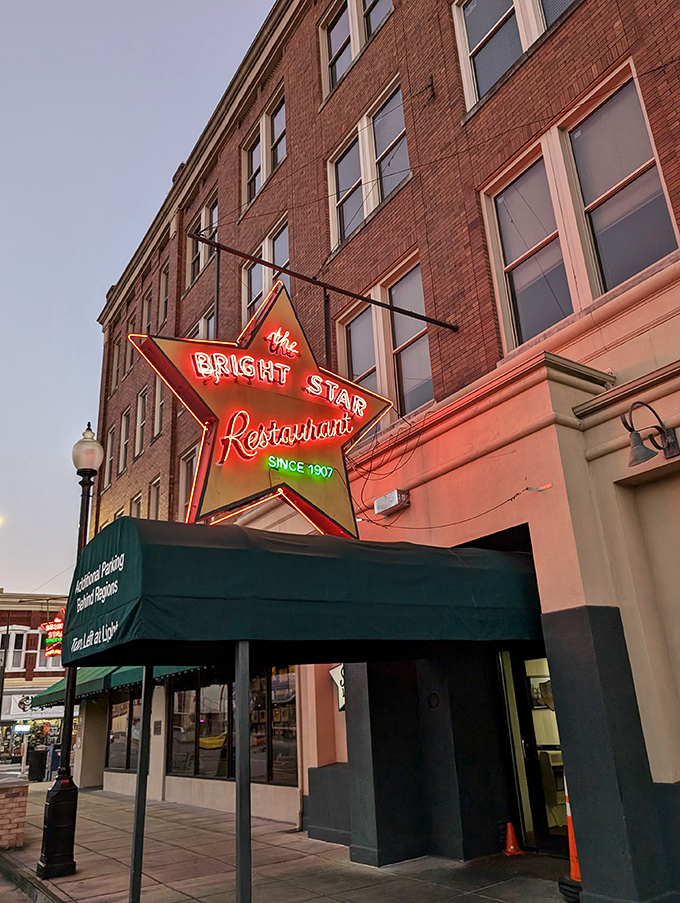 A star is born! The Bright Star's iconic neon sign beckons hungry travelers like a culinary lighthouse, promising delicious adventures within.