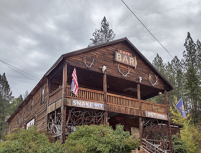 Step into a time machine disguised as a rustic cabin! The Snake Pit's weathered exterior promises Wild West adventures and hearty meals that'll make your inner cowboy yee-haw.