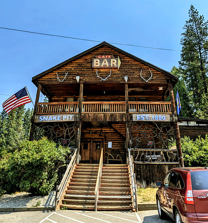 Step into a time machine disguised as a rustic cabin! The Snake Pit's weathered exterior promises Wild West adventures and hearty meals that'll make your inner cowboy yee-haw.