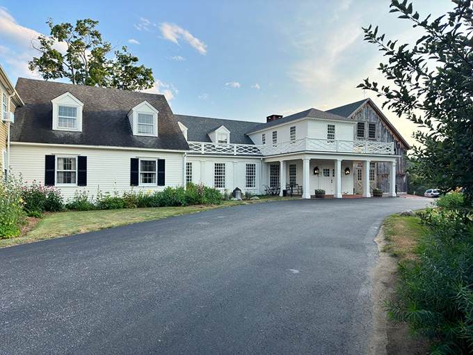 A colonial time capsule with a culinary twist! The Salem Cross Inn's pristine white exterior promises a journey through history &ndash; and your taste buds are invited along for the ride.