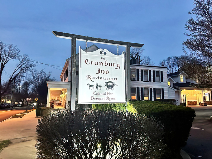 A slice of Americana served with a side of history! The Cranbury Inn stands proud, its white clapboard exterior a beacon for hungry time travelers.