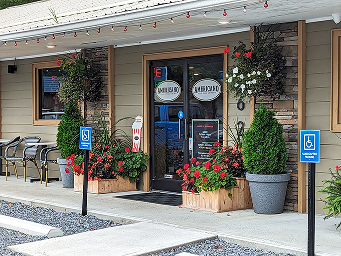 Welcome to flavor town! Americano's charming exterior, with its vibrant flowers and twinkling lights, promises a feast for both eyes and taste buds.