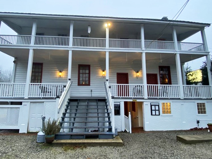 A Southern belle of a building! This charming colonial facade whispers tales of bygone eras, inviting you to step back in time for dinner.