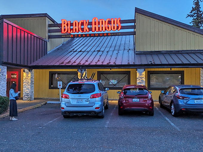 The iconic red sign beckons like a lighthouse for the beef-obsessed, promising respite from trendy small plates and deconstructed disappointments.