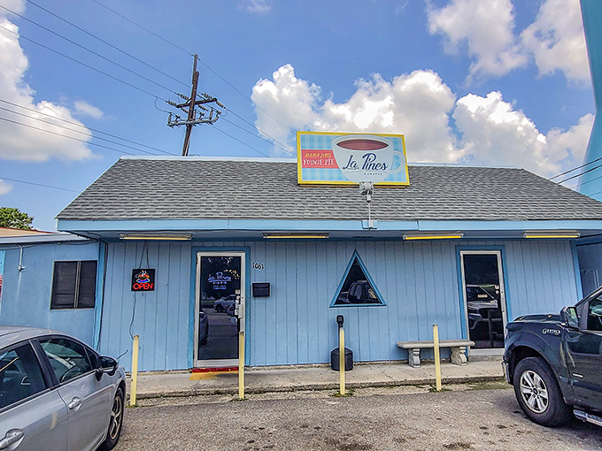 Blue skies and comfort food dreams! La Pines Cafe's exterior is like a retro postcard come to life, promising delicious adventures within.