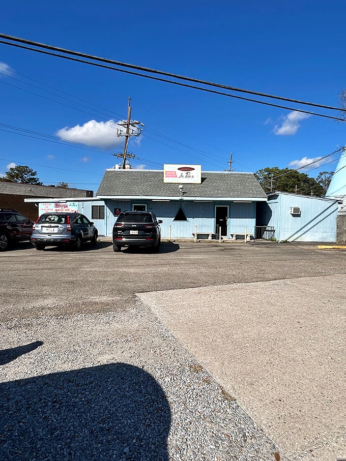 Blue skies and comfort food dreams! La Pines Cafe's exterior is like a retro postcard come to life, promising delicious adventures within.