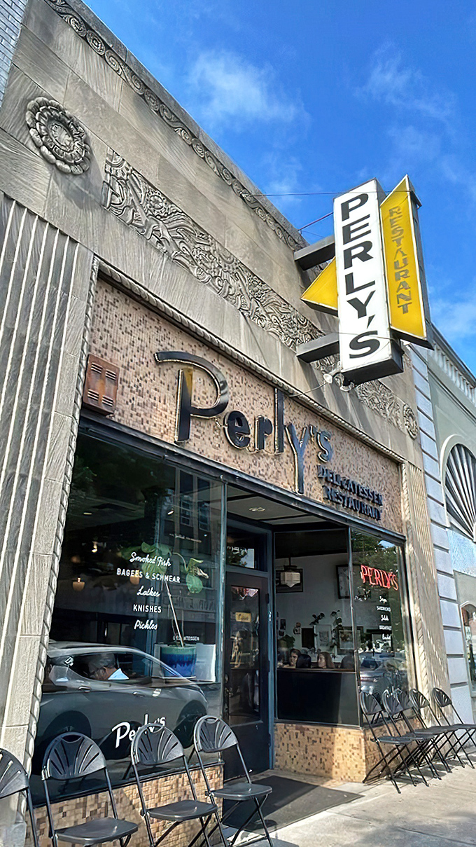 Perly's iconic storefront stands proud on Grace Street, its vintage yellow sign beckoning hungry Richmonders like a beacon of delicatessen delight.