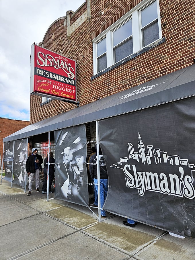 Cleveland's culinary crown jewel! Slyman's iconic sign promises a sandwich experience that'll make your taste buds do a happy dance.
