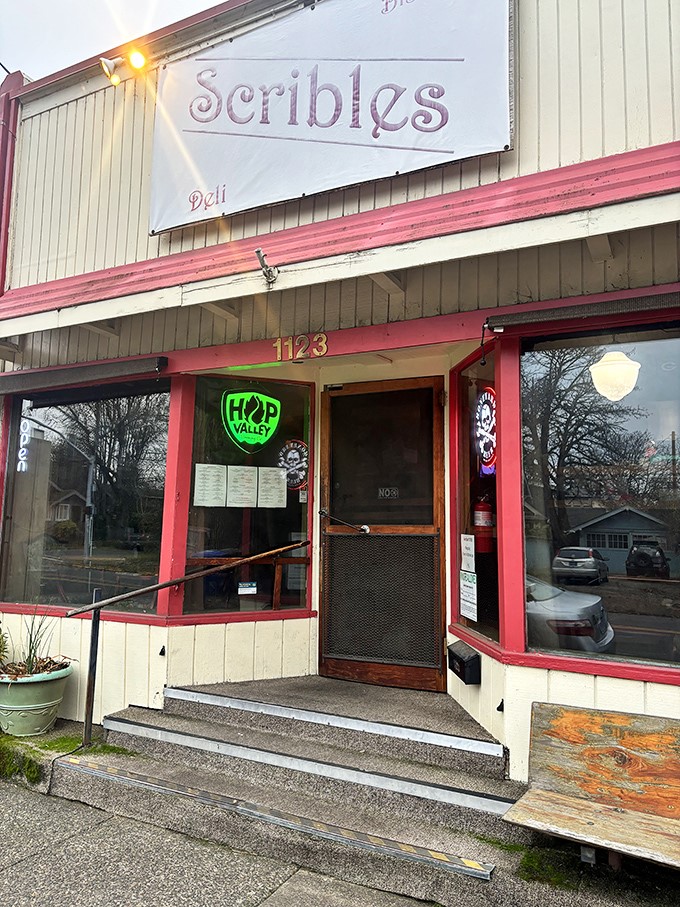 Welcome to sandwich paradise! Scribles Bistro & Deli's charming exterior promises a feast for the senses, with its inviting red trim and vintage-style sign.
