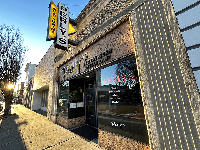 Perly's vintage storefront promises time travel via sandwich &ndash; the yellow sign beckons like a delicious lighthouse for the famished and fancy-free. 