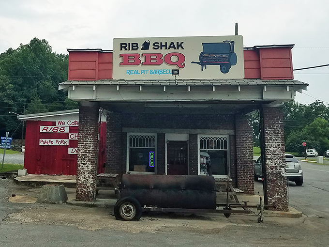 Welcome to flavor town! The Rib Shak's exterior promises a no-frills barbecue experience that'll have you singing the praises of pit-smoked perfection.