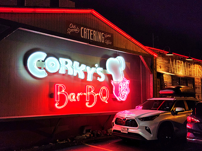 Neon dreams come true! Corky's Bar-B-Q sign blazes like a beacon for barbecue lovers, promising smoky delights and Memphis magic.