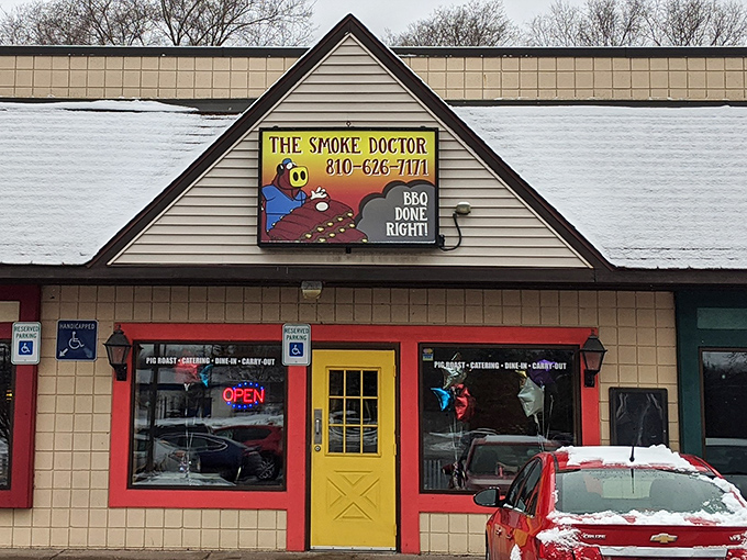 Welcome to BBQ paradise! The Smoke Doctor's cheerful yellow door is like a beacon of hope for hungry souls seeking smoky salvation.