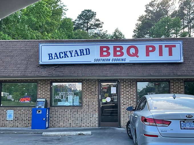 Welcome to BBQ paradise! Backyard BBQ Pit's unassuming exterior hides a world of smoky delights waiting to be discovered.