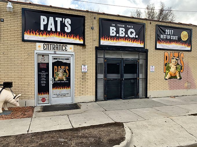 Welcome to flavor town! Pat's BBQ's exterior might be unassuming, but those flames promise a smoky paradise within.