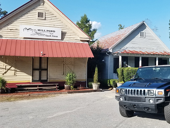 Welcome to Mill Pond Steakhouse, where the unassuming exterior hides a carnivore's paradise. It's like finding a diamond mine disguised as a cozy country cottage!