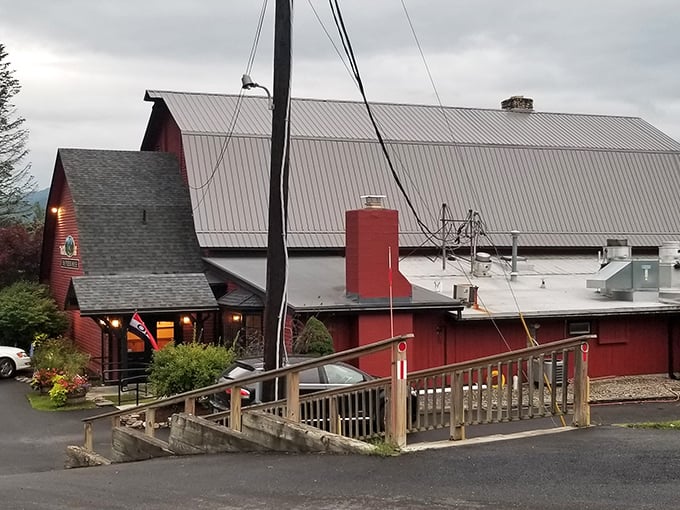 A barn-raising good time! The Publyk House stands tall, its red exterior a beacon for hungry travelers seeking a taste of Vermont charm.
