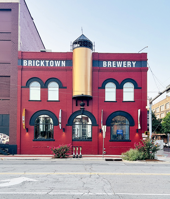 The iconic red brick exterior of Bricktown Brewery welcomes visitors. History and hops unite under one distinctive awning.
