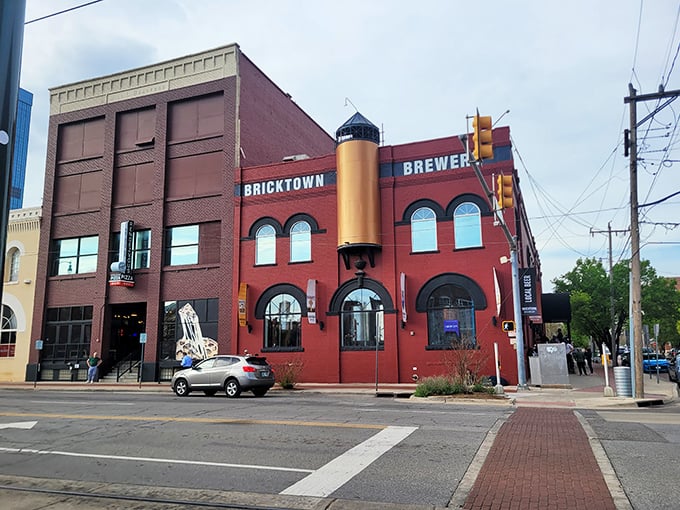 The iconic red brick exterior of Bricktown Brewery welcomes visitors. History and hops unite under one distinctive awning.