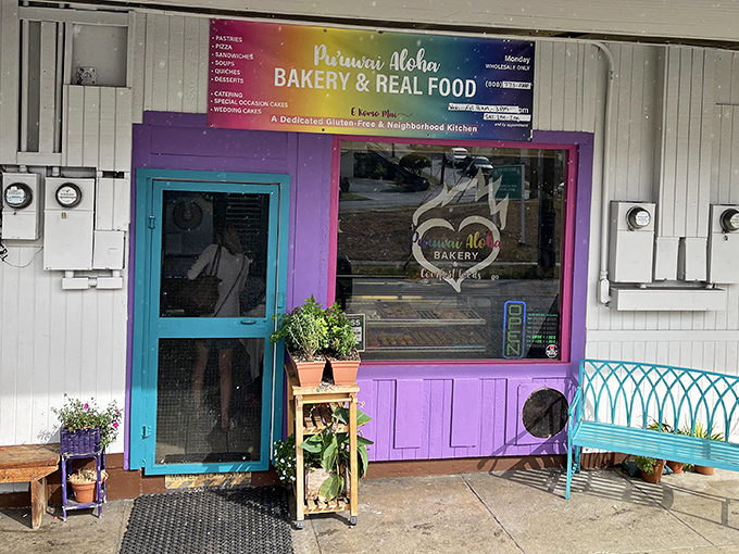 Welcome to carb paradise! Pu'uwai Aloha Bakery's cheerful exterior is like a beacon of hope for the sugar-deprived. It's the Willy Wonka factory of pastries, minus the Oompa Loompas.