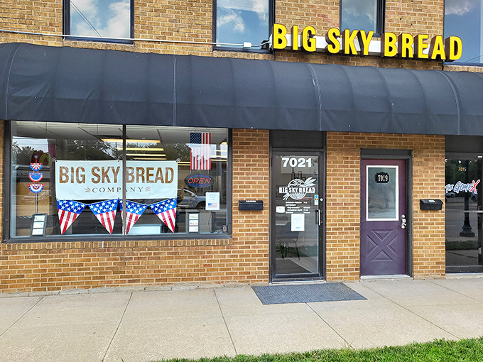 Stars and stripes forever! This patriotic storefront isn't just waving flags—it's wafting the irresistible aroma of freshly baked bread across Urbandale.