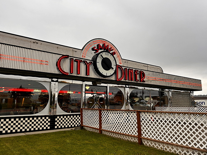 Step into a time machine, folks! This retro-fabulous exterior is your portal to comfort food paradise. Sami's City Diner beckons with its neon glow and promise of delicious nostalgia.