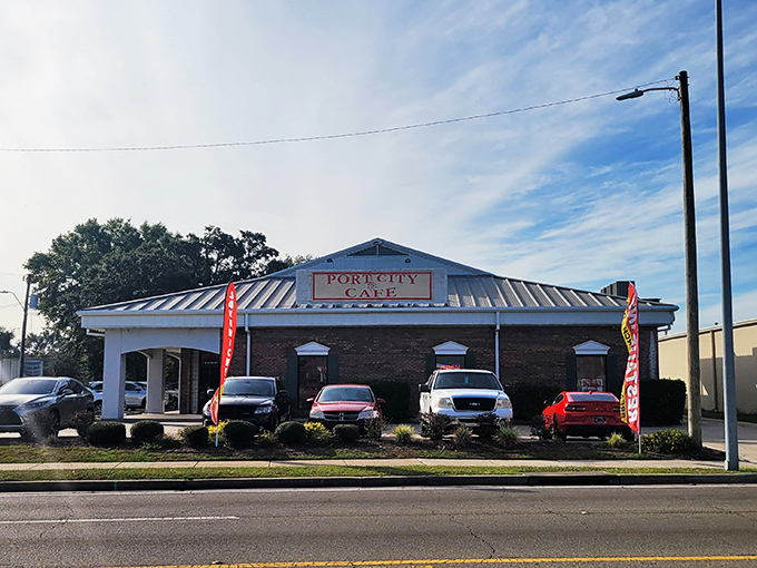 Welcome to Port City Cafe, where the sign promises good eats and the brick exterior whispers "local gem." This unassuming facade hides a breakfast lover's paradise.