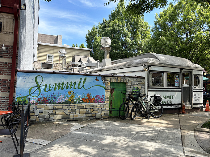 Step into a time machine disguised as a diner! This gleaming silver beauty has been serving up nostalgia and hearty meals since 1929. 