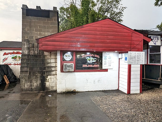 A barbecue beacon in brick and mortar! This unassuming red shack houses smoky treasures that'll make your taste buds dance with joy.