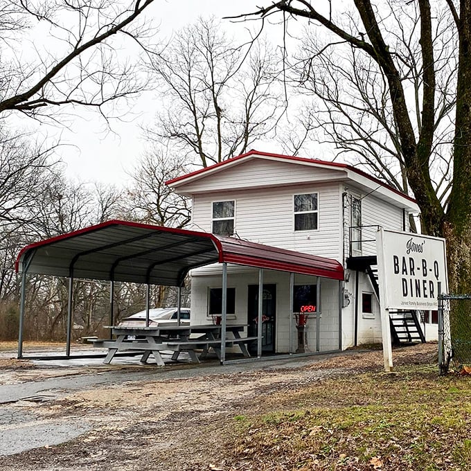 Welcome to barbecue heaven! Jones Bar-B-Q Diner's unassuming exterior hides a world of smoky delights. It's like finding a treasure chest disguised as a garden shed.